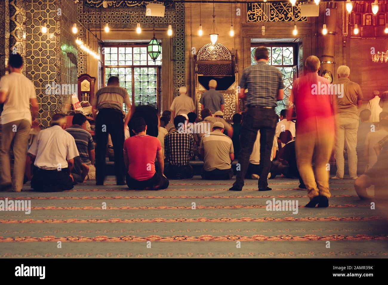 People praying inside the New Mosque Stock Photo - Alamy