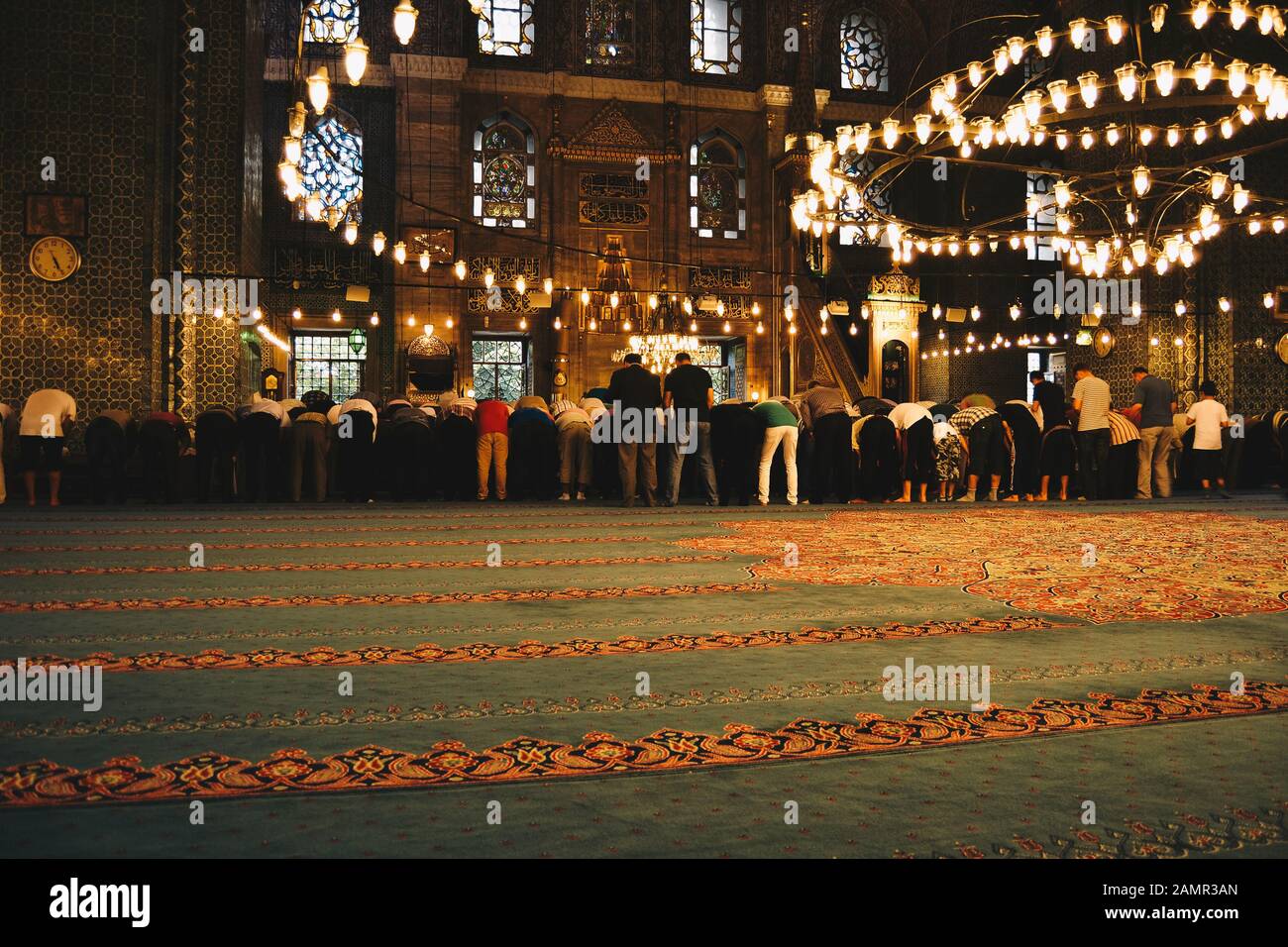 People praying inside the New Mosque Stock Photo - Alamy