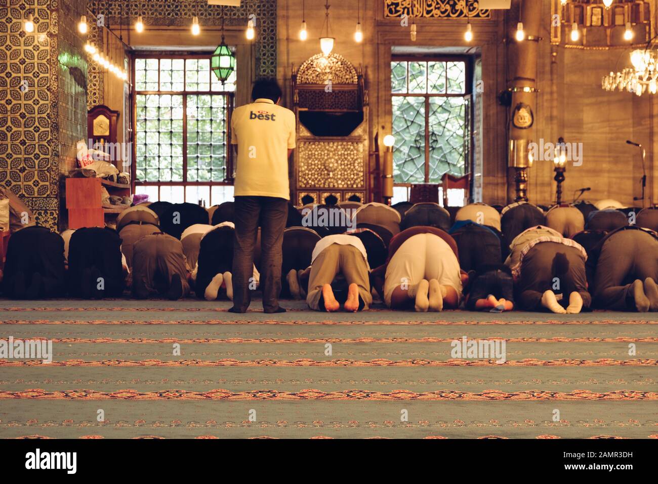 People praying inside the New Mosque Stock Photo - Alamy