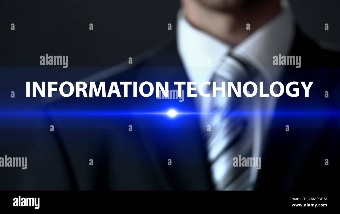 Information technology, businessman in suit standing in front of screen ...