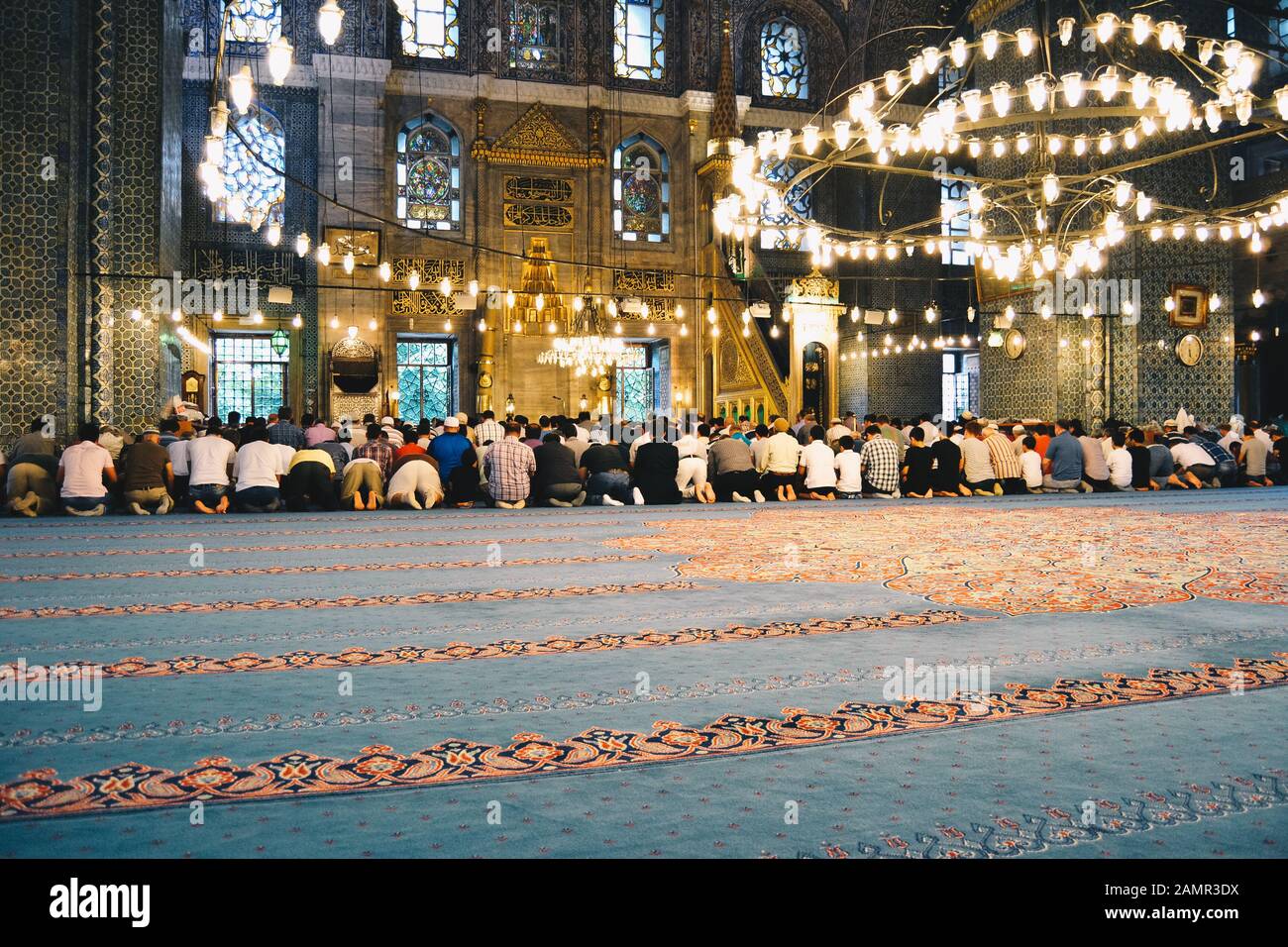 People praying inside the New Mosque Stock Photo - Alamy