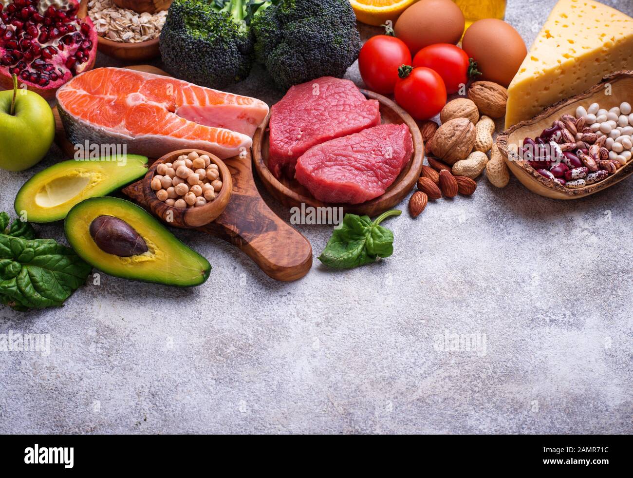 Meat, fish, legumes, nuts and vegetables Stock Photo - Alamy