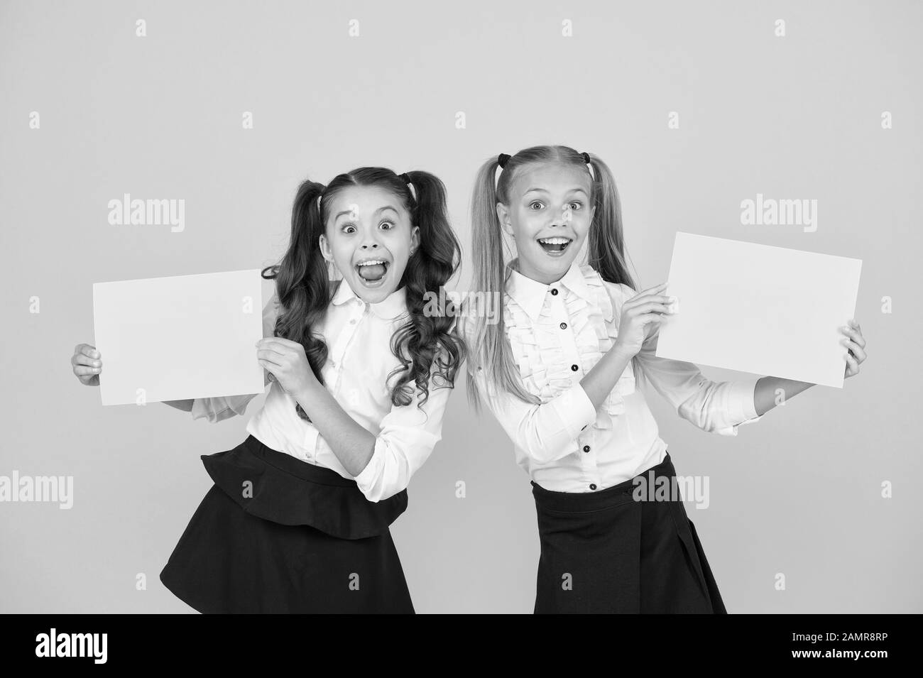 Girls school uniform hold poster. School girls show poster. Social ...