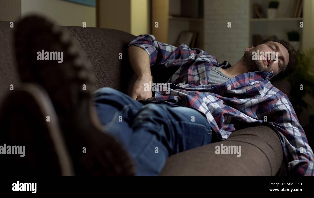 Grubby sofa man hi-res stock photography and images - Alamy