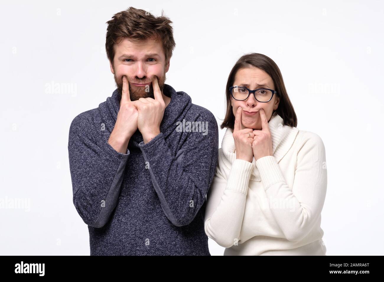 Sad wife and husband having life problems trying to smile, distressed ...
