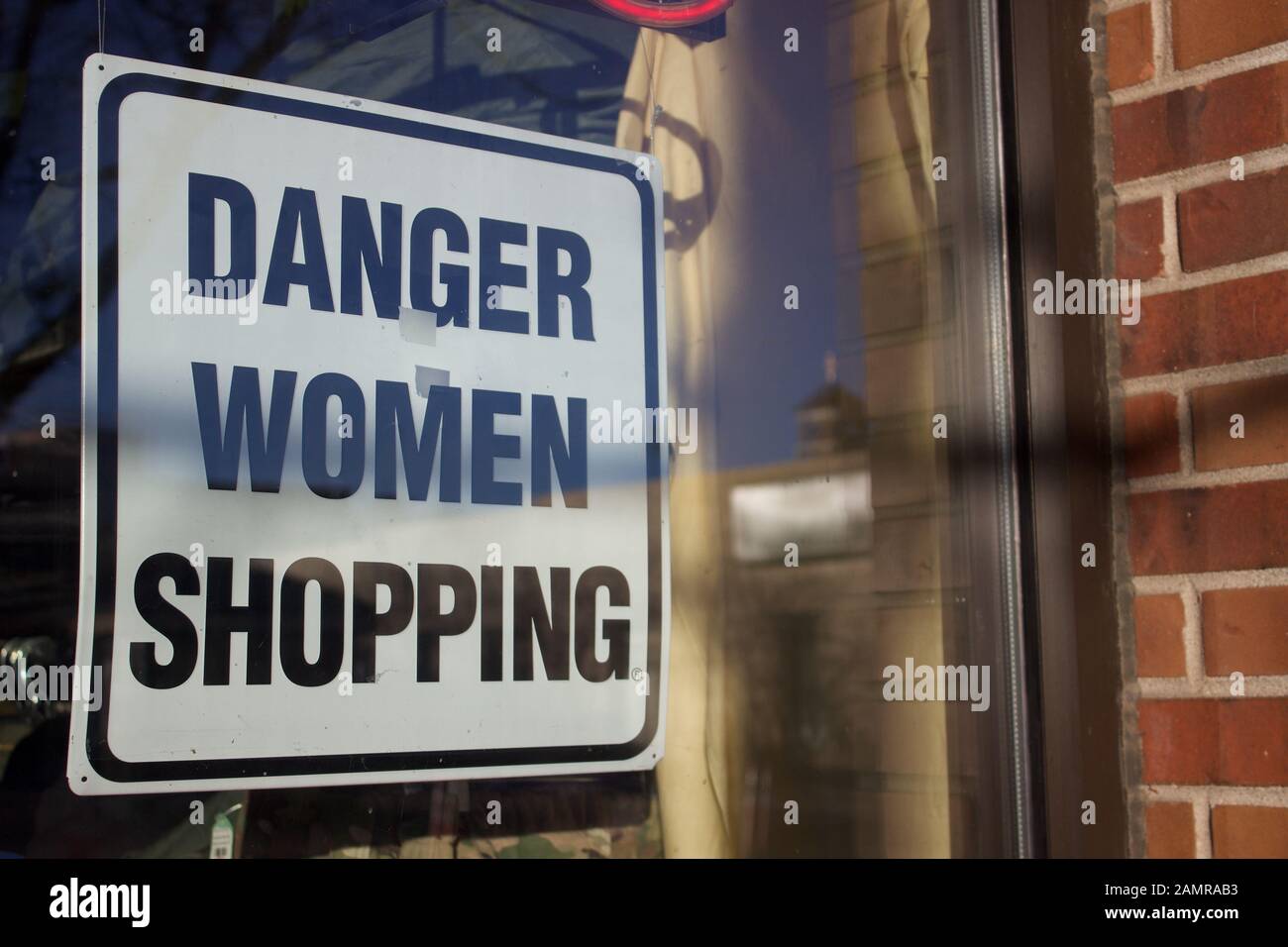 A sign in the window of an Army/Navy surplus store Stock Photo - Alamy