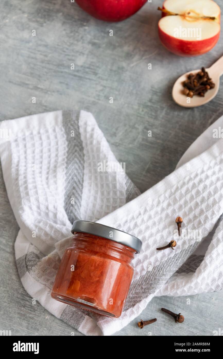 Homemade jam with red apples and cloves Stock Photo - Alamy