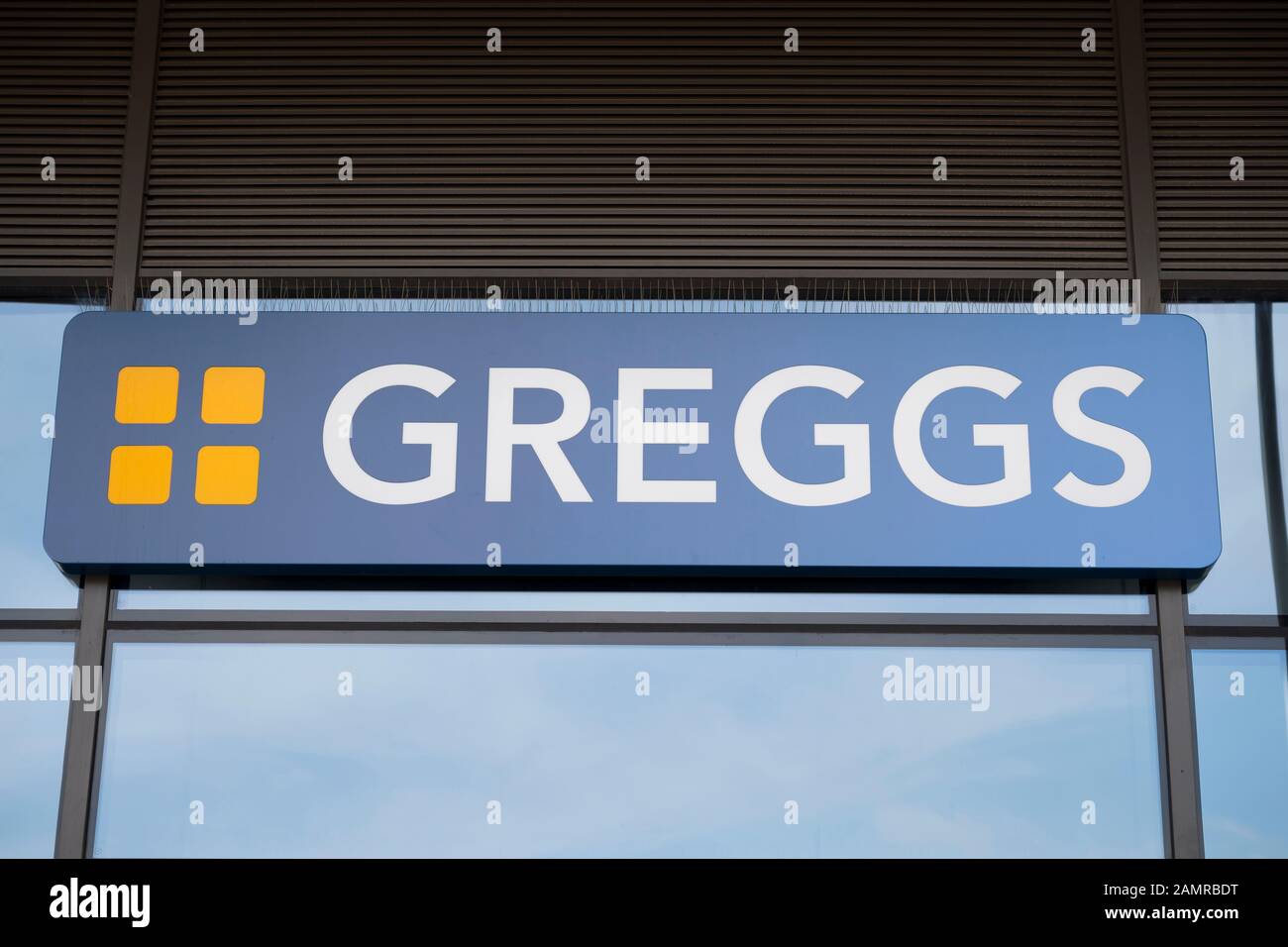A close-up of a Greggs store sign in the UK Stock Photo - Alamy