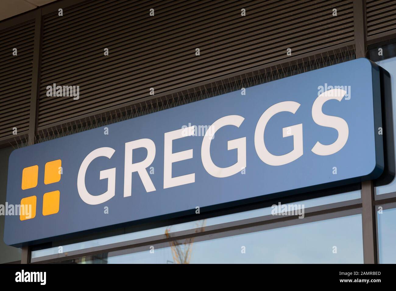 A close-up of a Greggs store sign in the UK Stock Photo - Alamy