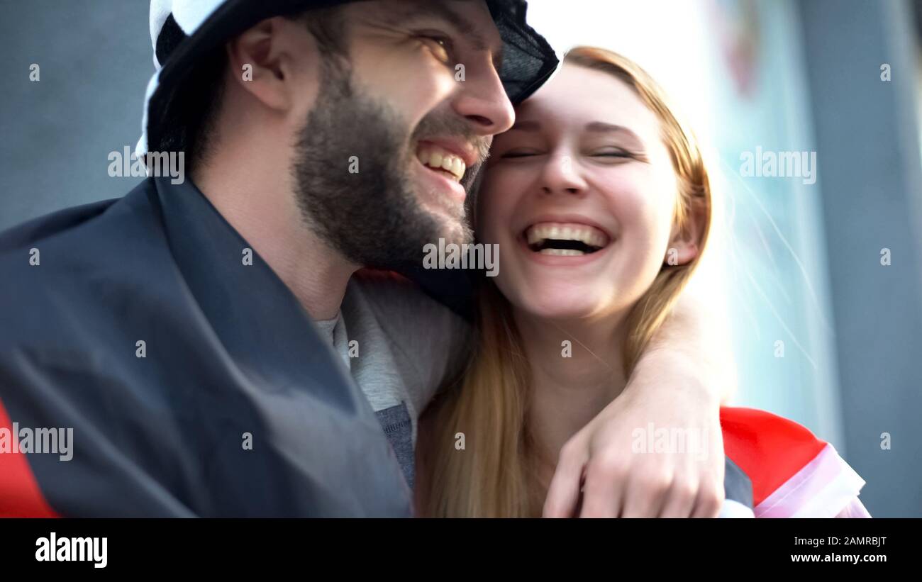 Fans smiling hi-res stock photography and images - Alamy