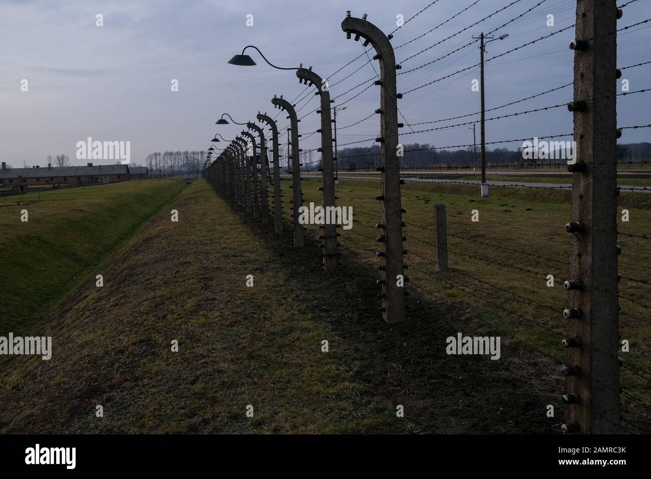 AUSCHWITZ, POLAND - 20 December 2019: electric fence with barbed wire ...