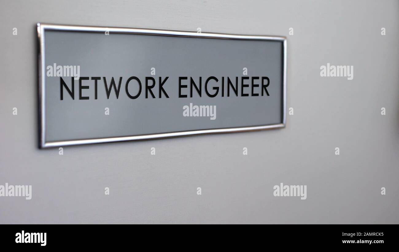 Network engineer office door desk closeup, maintenance of computer ...