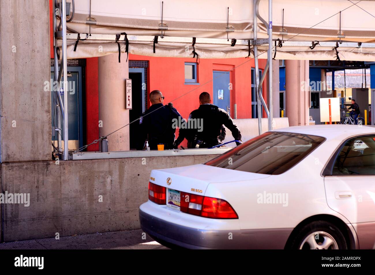 Vehicles passing through the U.S. Customs and Border Protection zone at ...