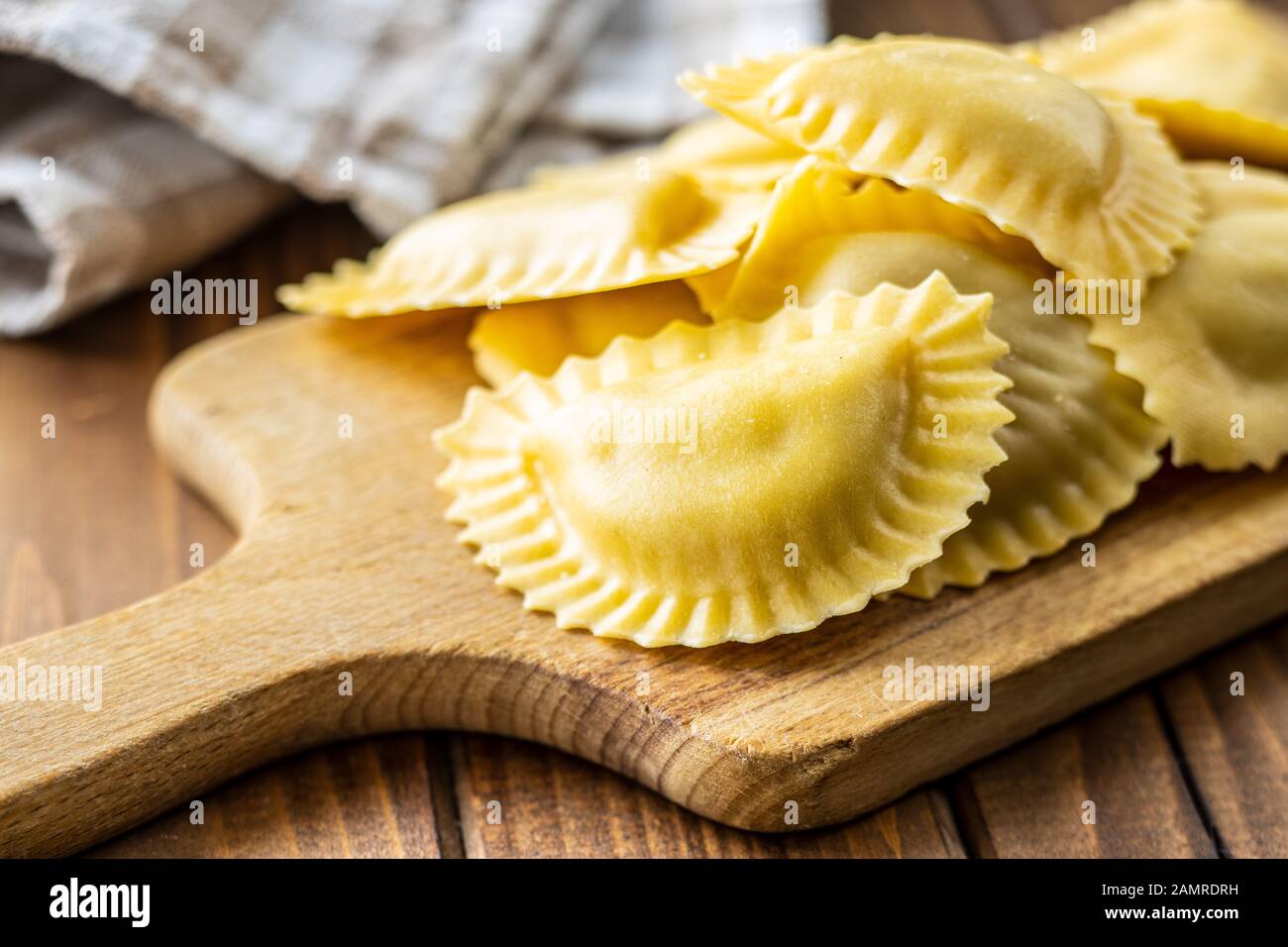 Italian stuffed pasta. Panzerotti pasta on cutting board Stock Photo ...