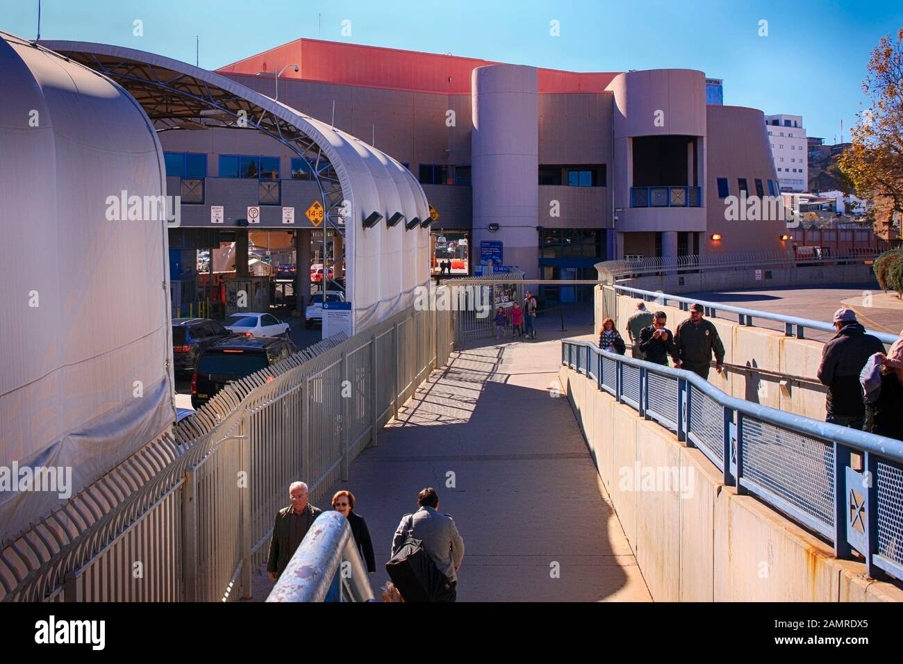 Pedestrians passing through the U.S. Customs and Border Protection zone ...