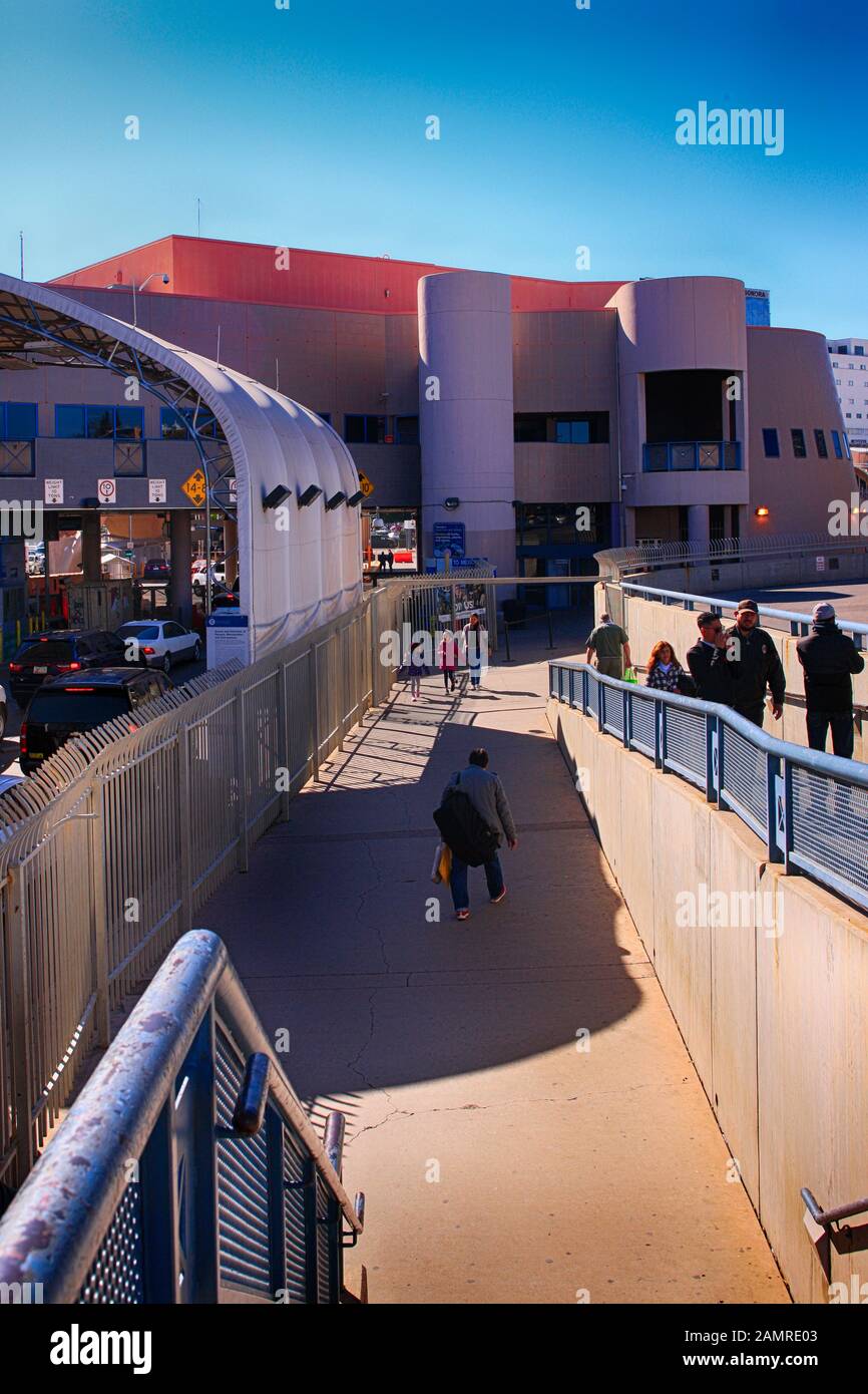 Pedestrians passing through the U.S. Customs and Border Protection zone ...