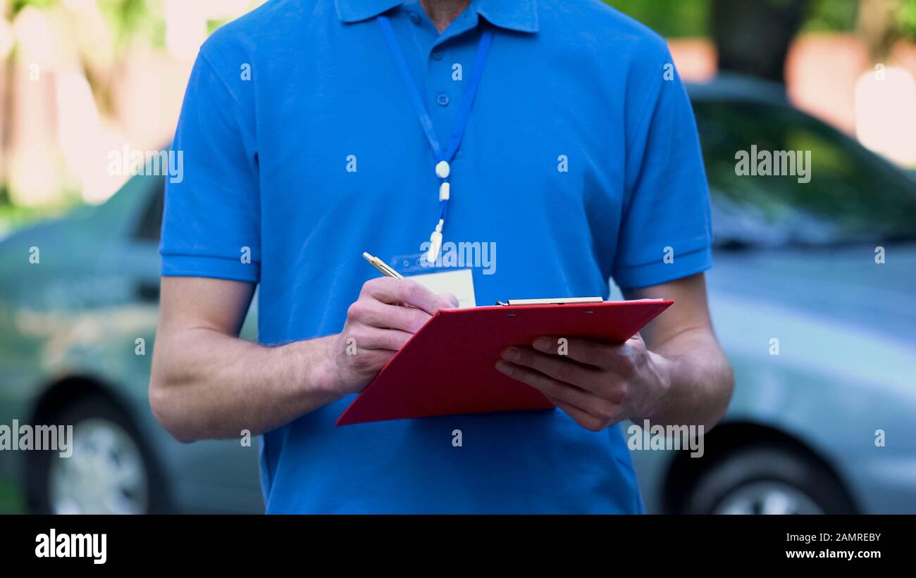 Delivery man giving proof document for signature, paperwork parcel ...