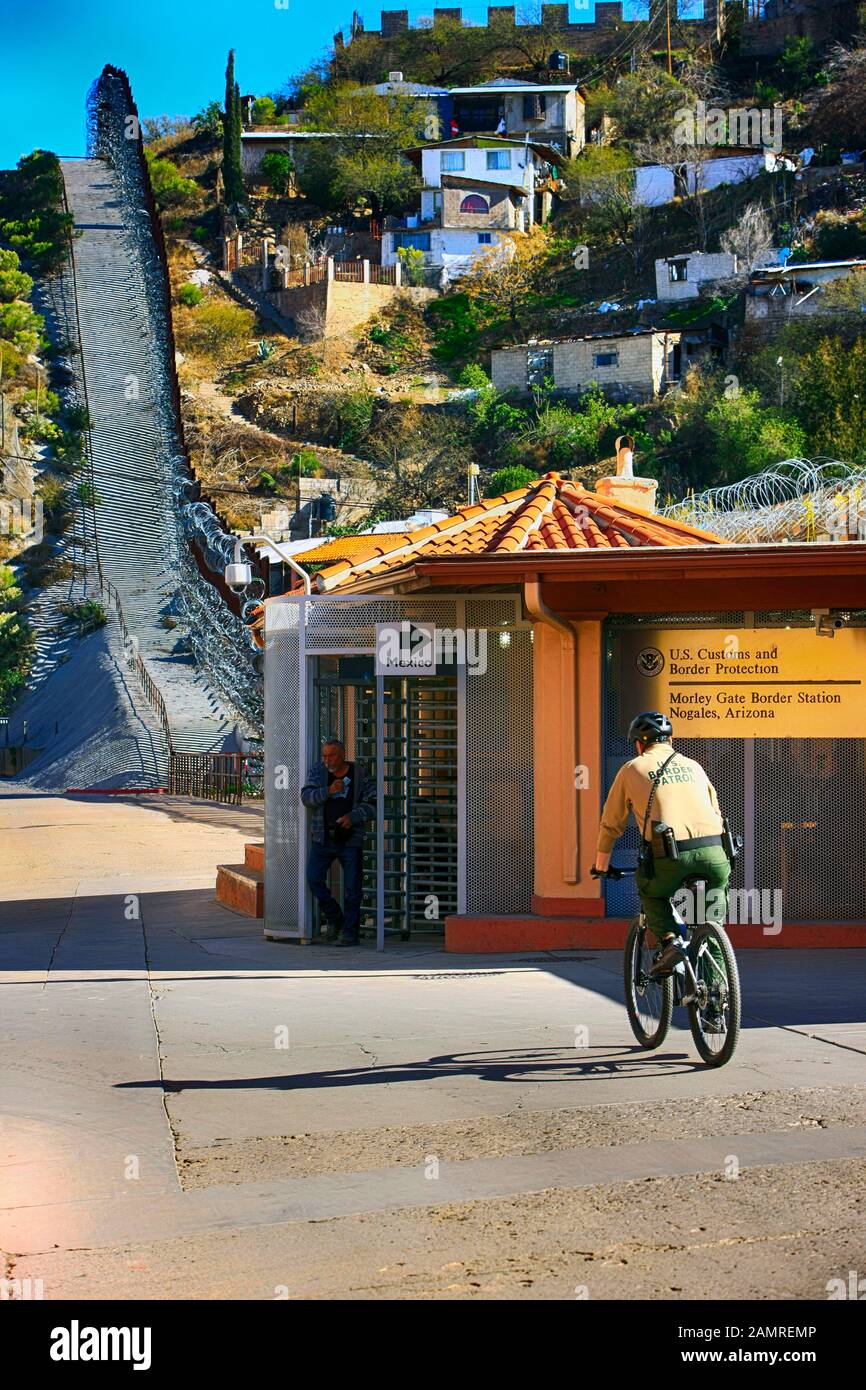 Border Patrol agent arrivng for work on his his bicycle at the U.S ...