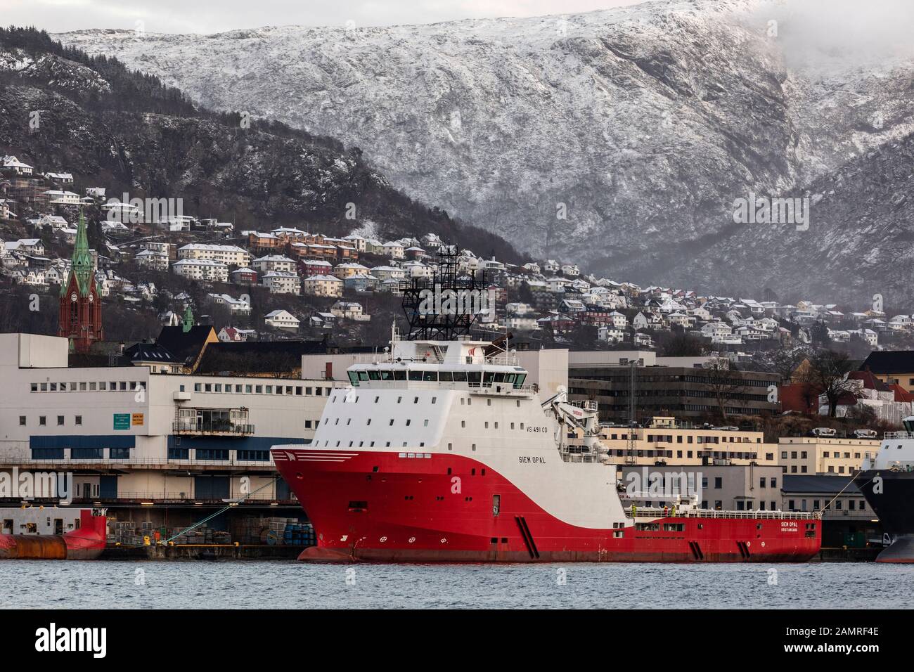 Offshore AHTS anchor handling vessel Siem Opal at Dokken quay. Snow ...