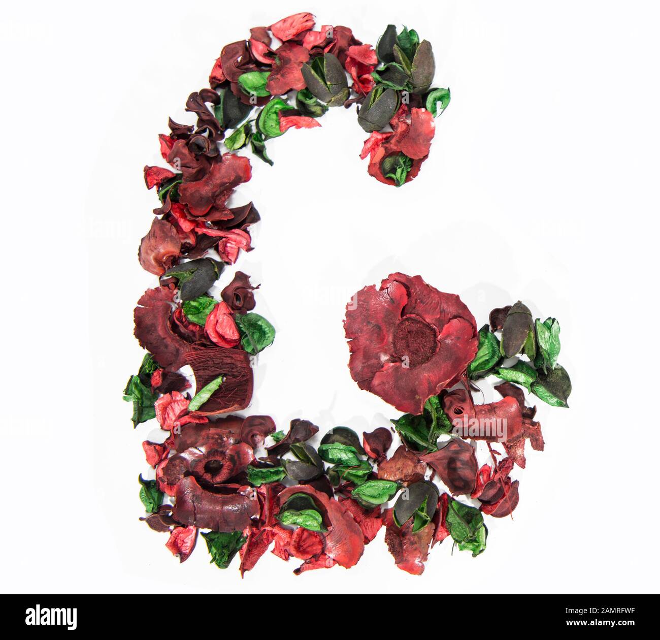 Latin alphabet letter made from dry rose flowers Stock Photo - Alamy