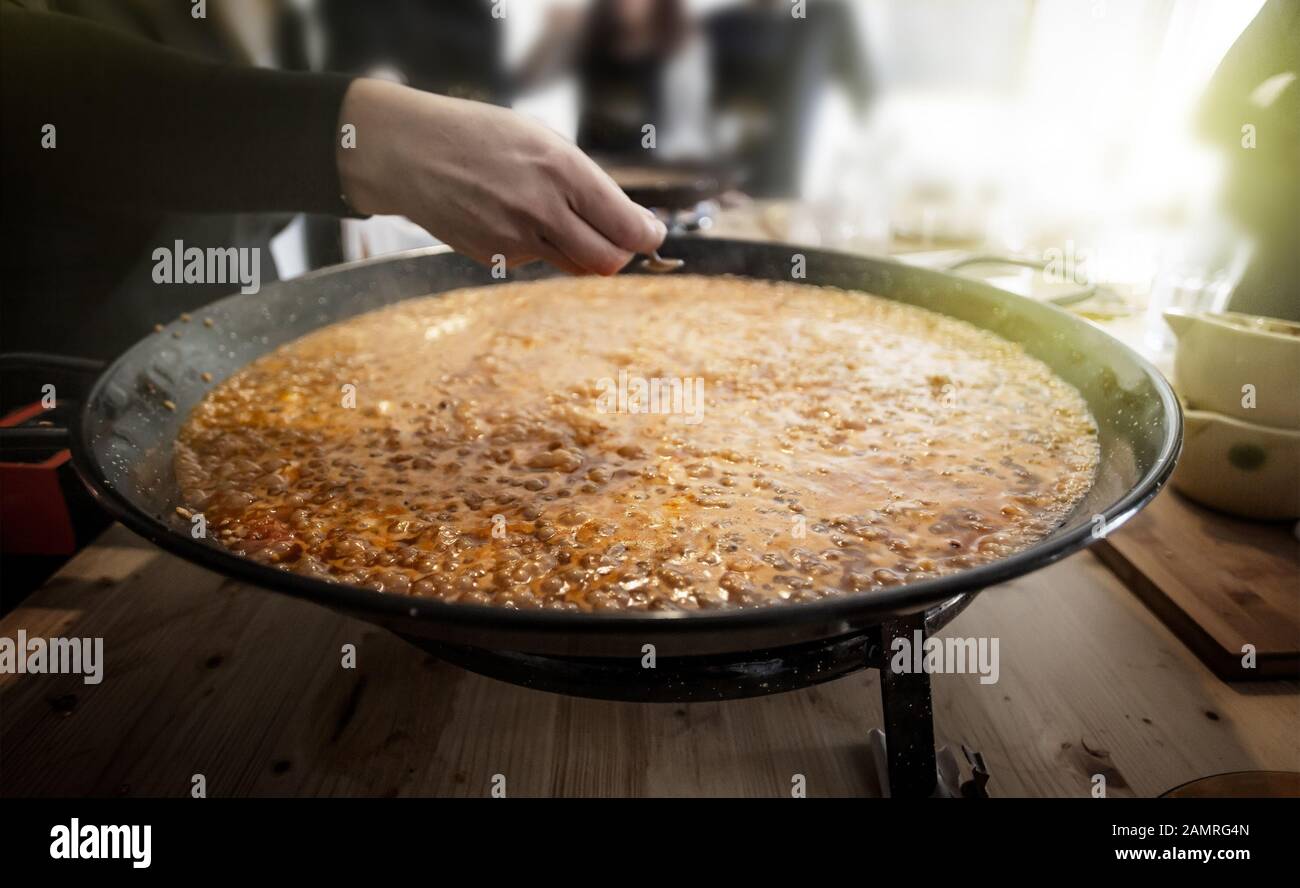 Paella pan with traditional Spanish food usually prepared with rice ...
