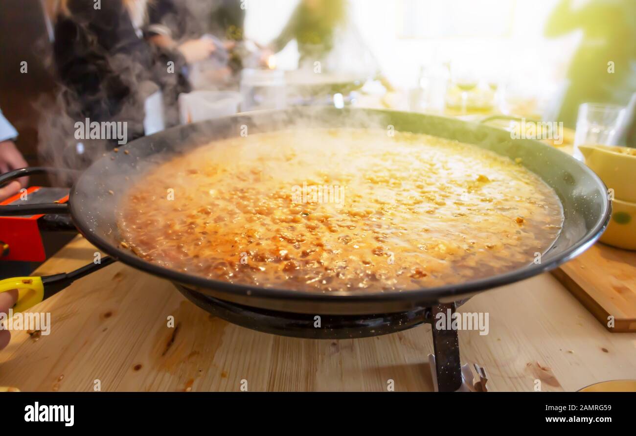 Paella pan with traditional Spanish food usually prepared with rice ...