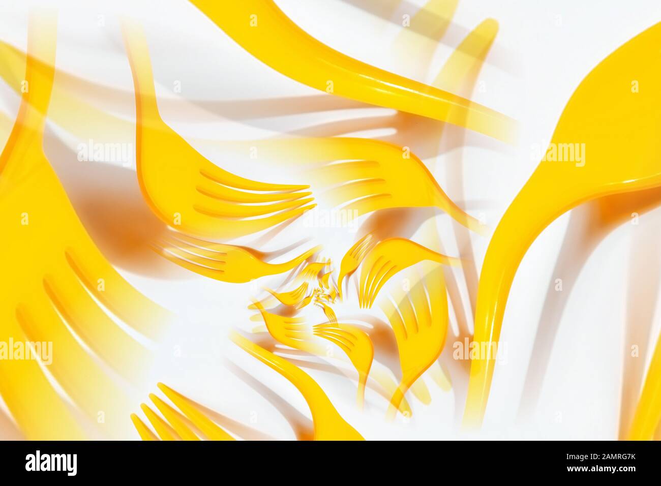 Bright yellow forks in spirals Stock Photo - Alamy