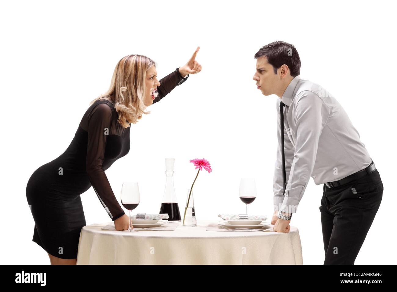 Man and woman arguing at a restaurant table isolated on white ...