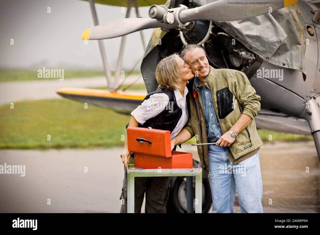 Plane man woman kissing hi-res stock photography and images - Alamy