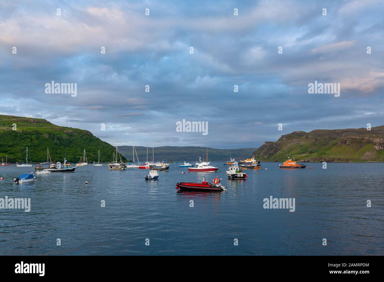 Sunset over the harbor in Portree, Isle of Skye, Scotland Stock Photo ...