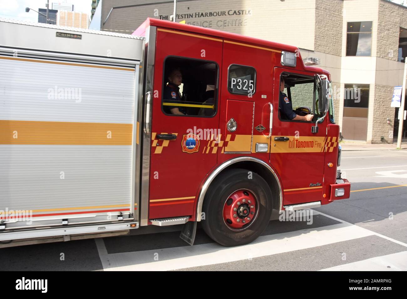 Fire department vehicle rushing in the streets of Toronto, Canada Stock ...