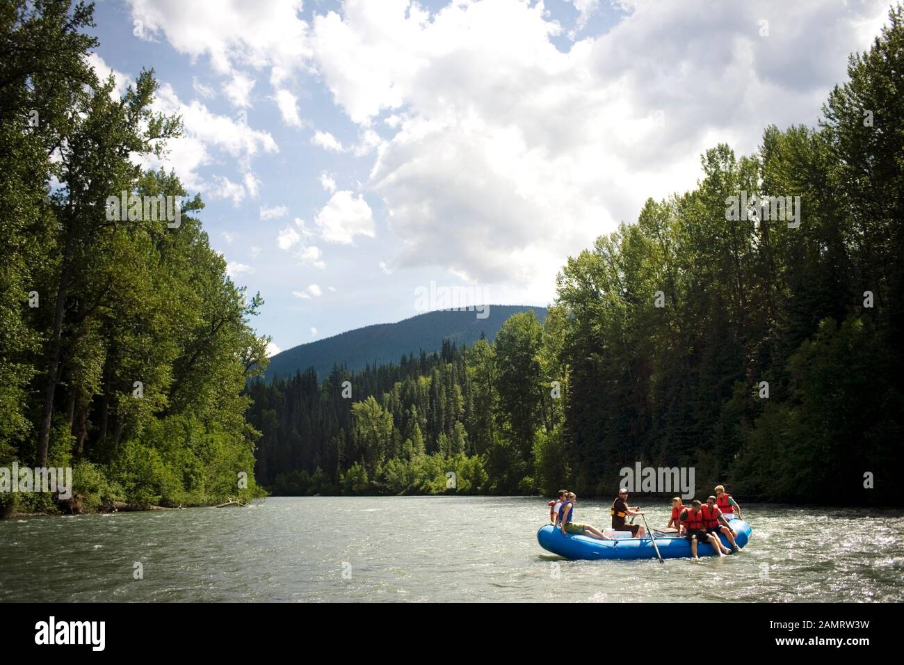 Group of people rafting along a river Stock Photo - Alamy
