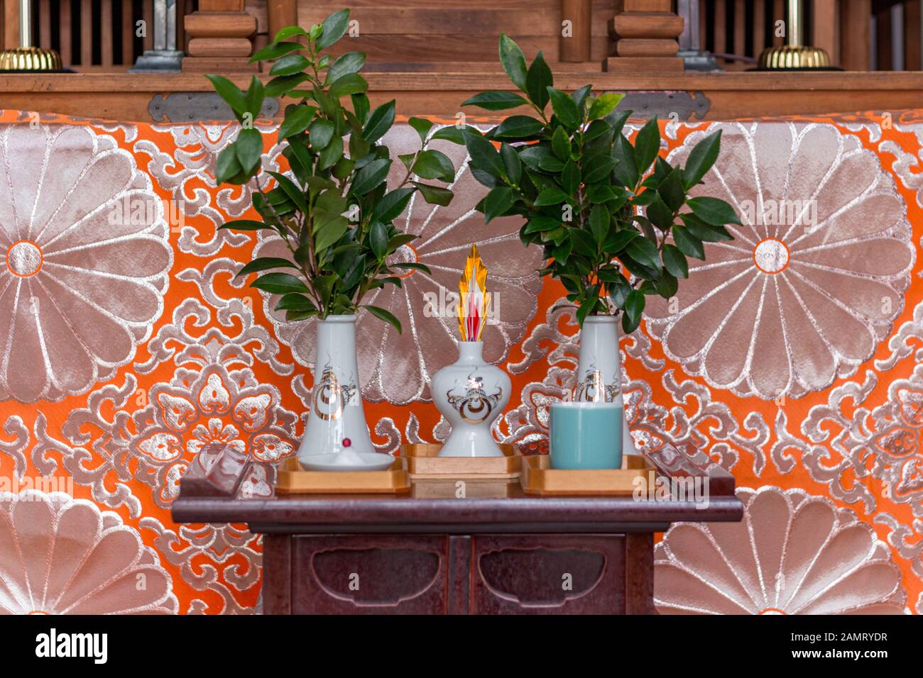 Altar at small local shinto shrine, with offerings of sacred green ...