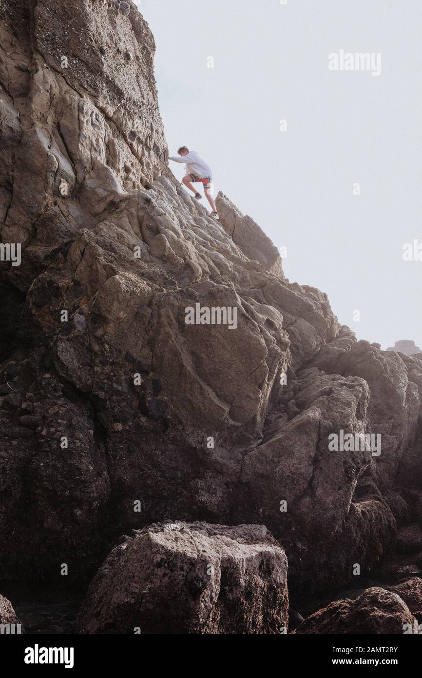 Children climbing rock hi-res stock photography and images - Alamy