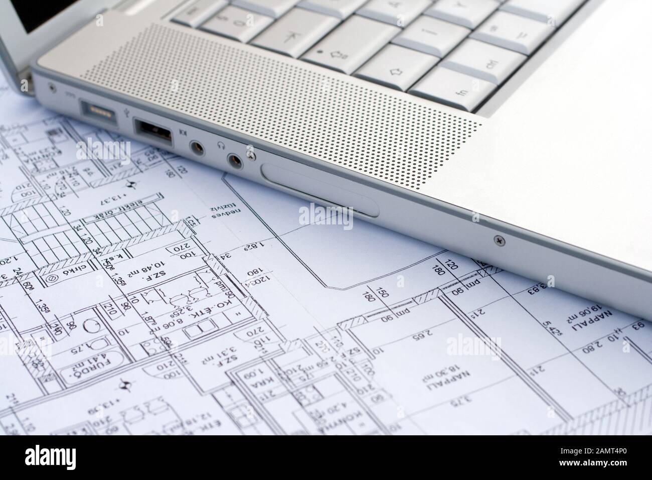 Laptop, rulers and pens on a floor map Stock Photo - Alamy