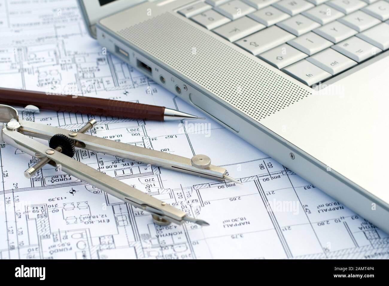 Laptop, rulers and pens on a floor map Stock Photo - Alamy