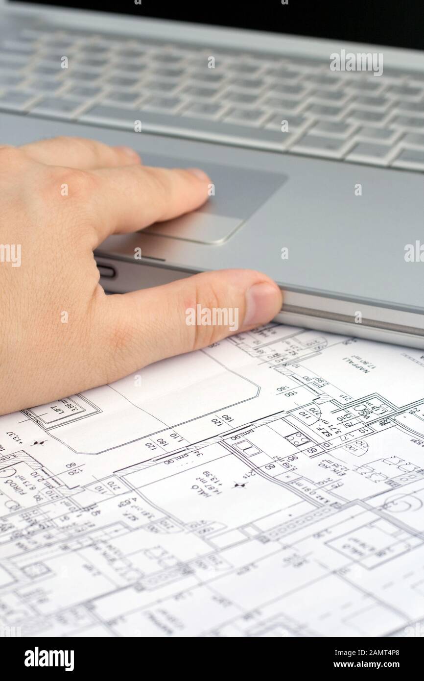 Laptop, rulers and pens on a floor map Stock Photo - Alamy