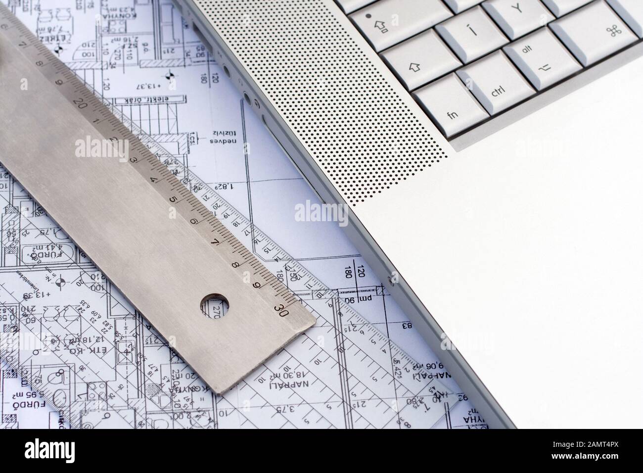 Laptop, rulers and pens on a floor map Stock Photo - Alamy
