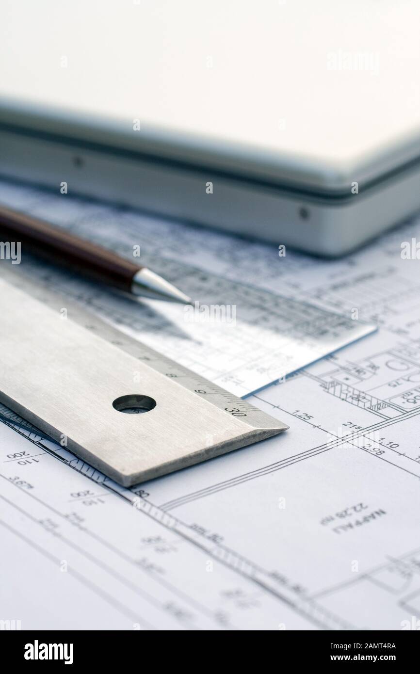 Laptop, rulers and pens on a floor map Stock Photo - Alamy