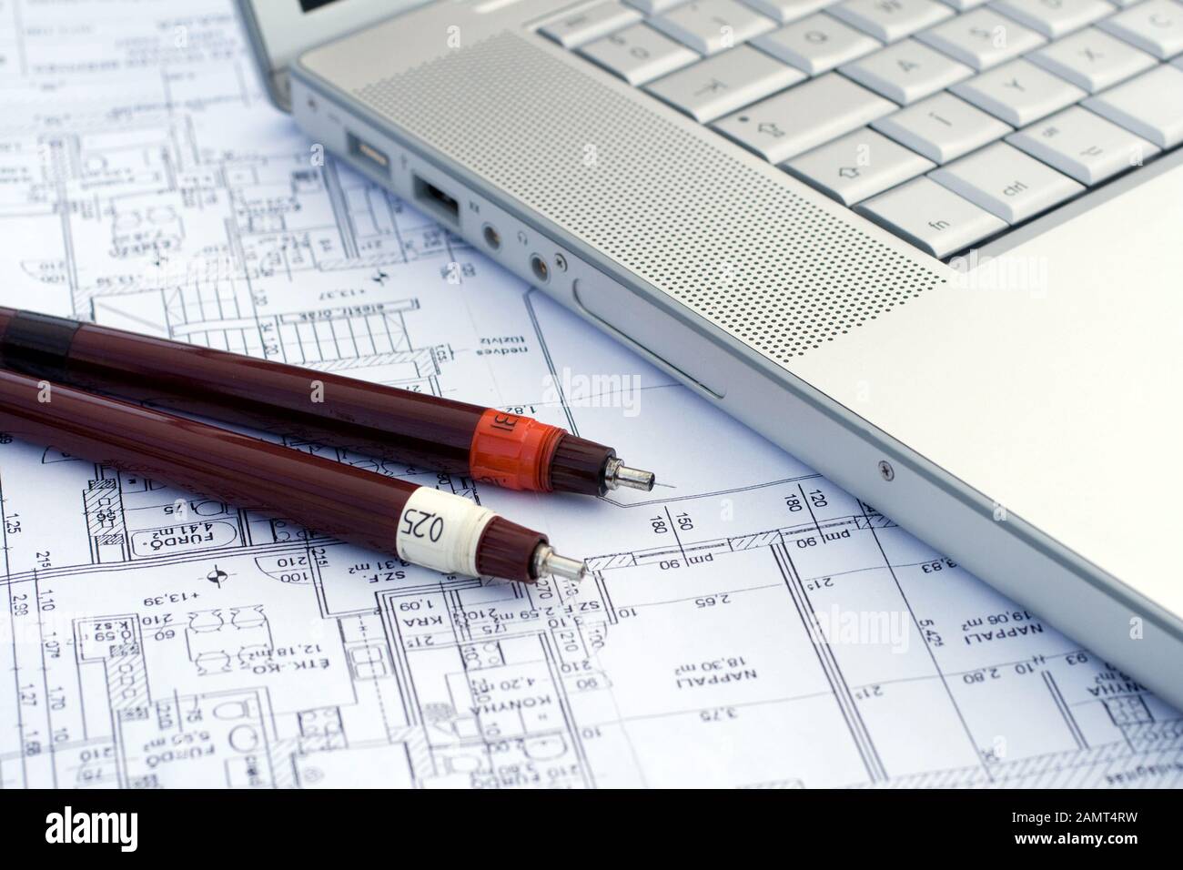 Laptop, rulers and pens on a floor map Stock Photo - Alamy