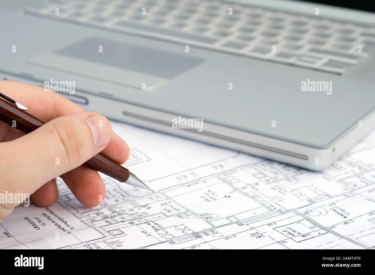 Laptop, rulers and pens on a floor map Stock Photo - Alamy
