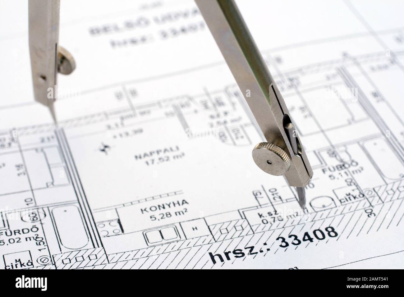Drawing compass on a floor plan Stock Photo - Alamy