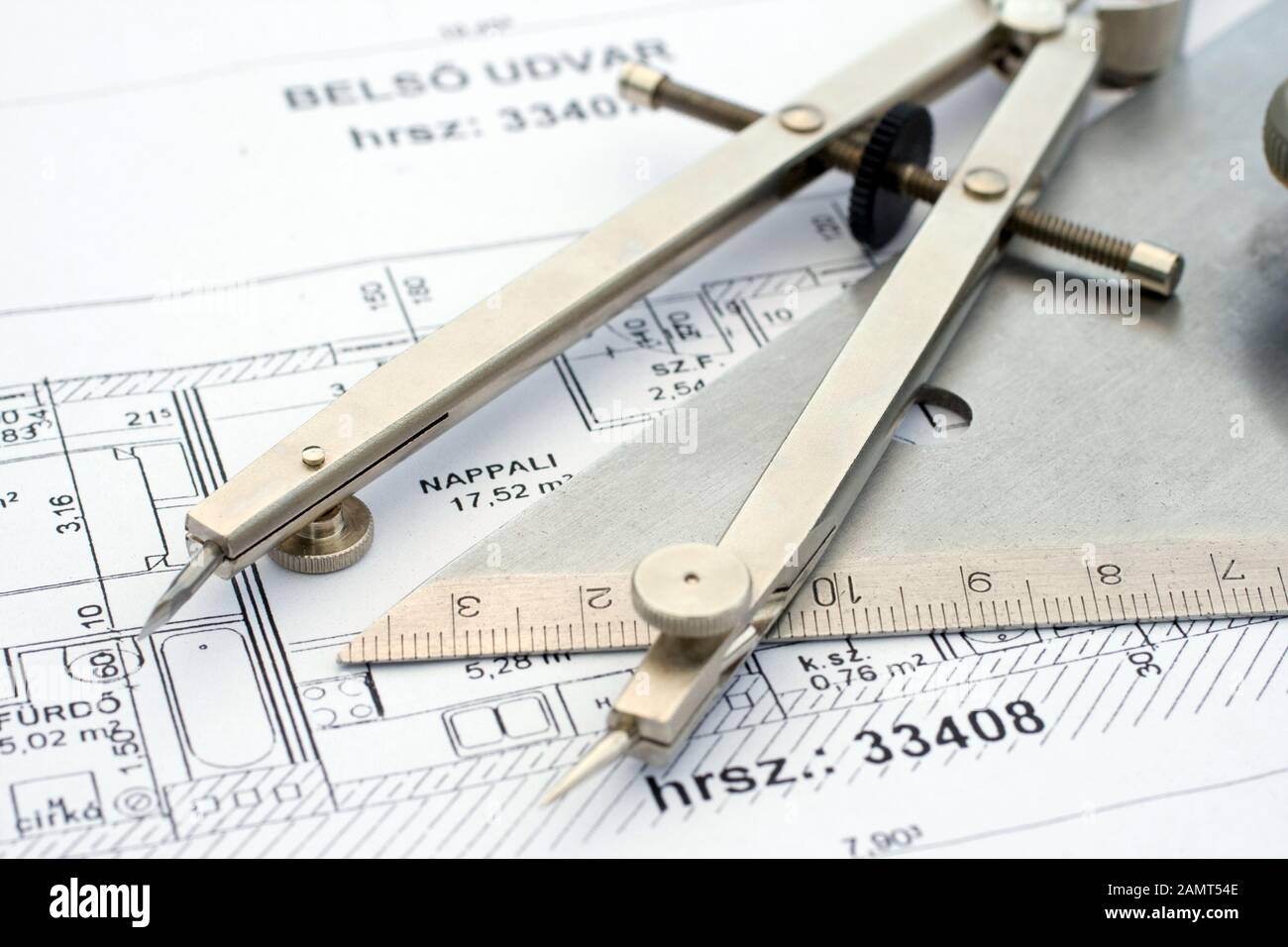 Drawing compass on a floor plan Stock Photo - Alamy