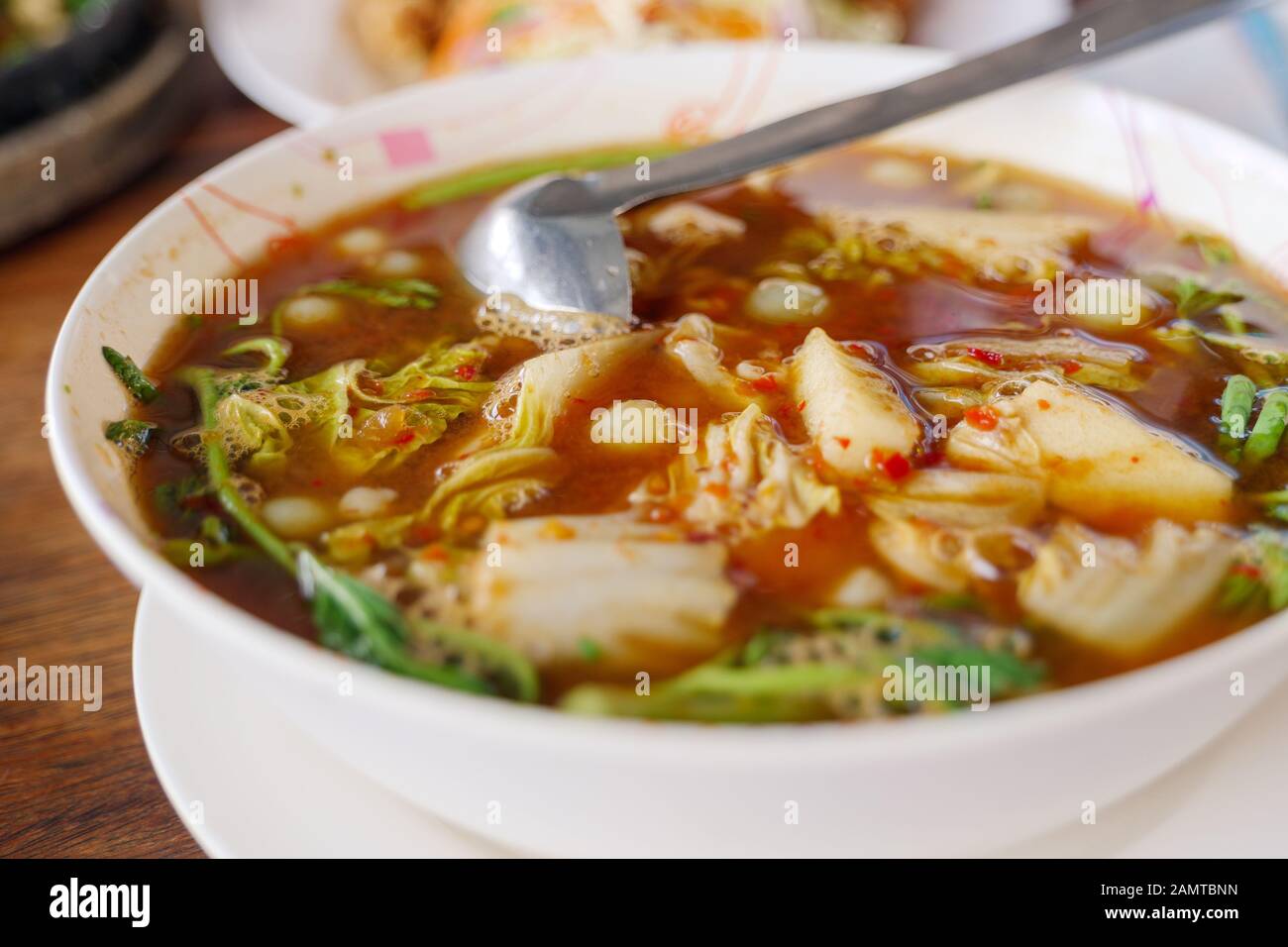 Thai spicy Sour curry soup with Roe or egg giant catfish and vegetable ...