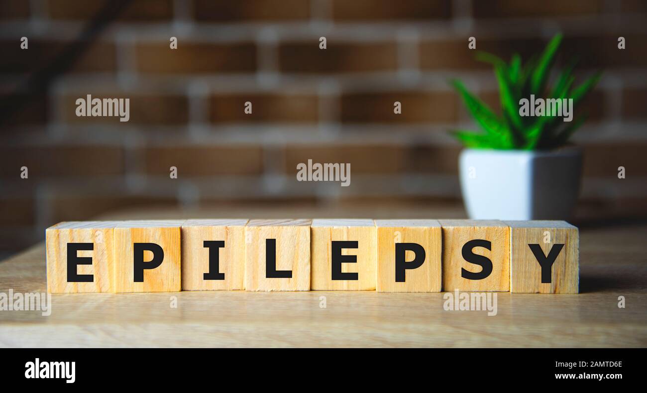 EPILEPSY word on wooden cubes, background. Concept of epilepsy ...
