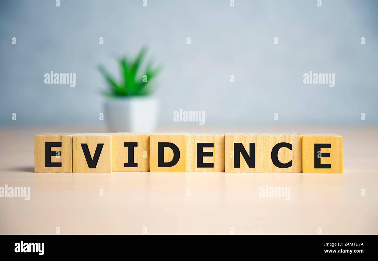 Word EVIDENCE composed of wooden letters. science concept Stock Photo ...