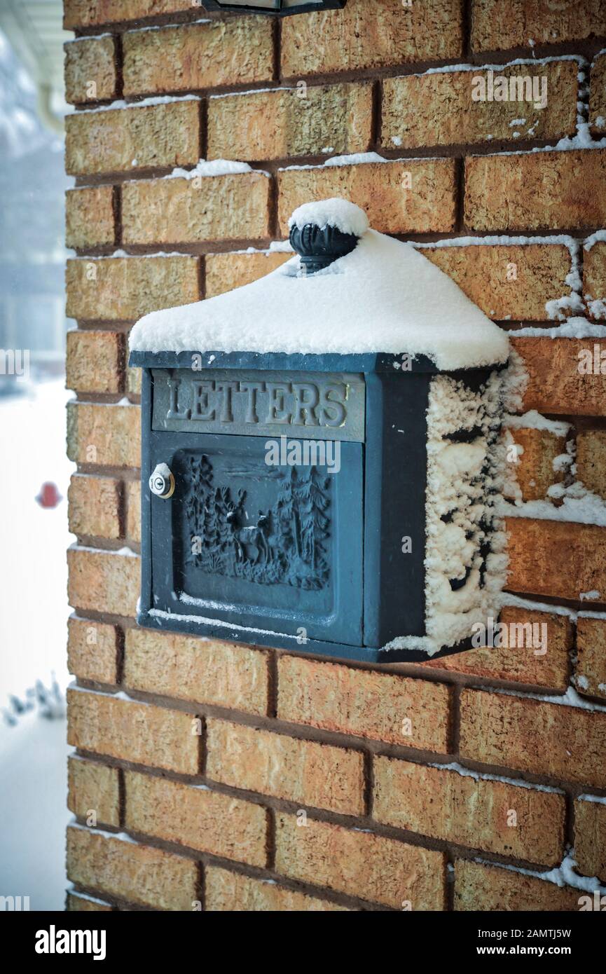 Mailbox covered with snow Stock Photo - Alamy