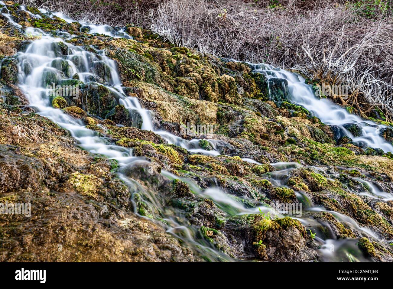 stone water channel full of running water in Tierra del Trigo village ...