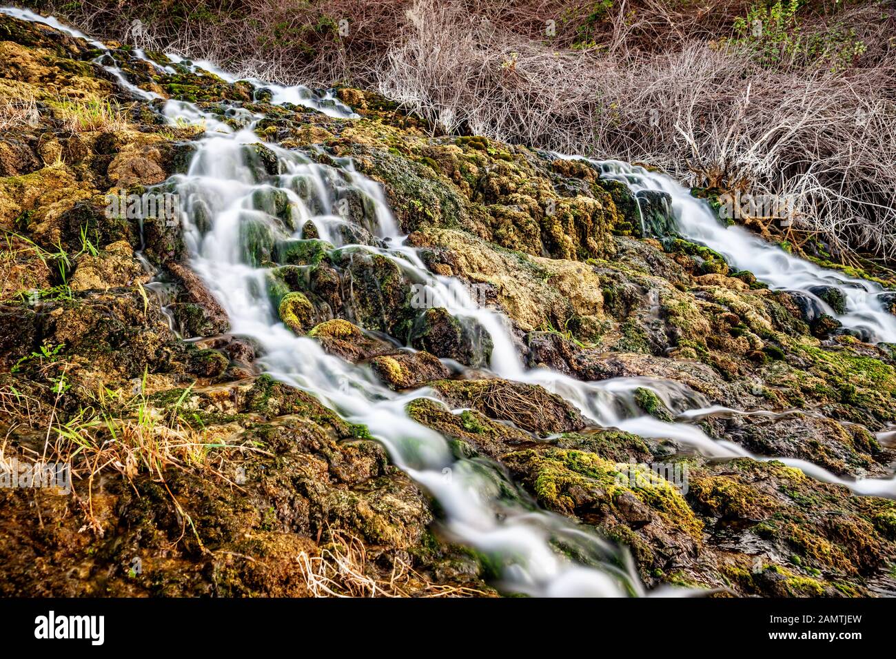 stone water channel full of running water in Tierra del Trigo village ...