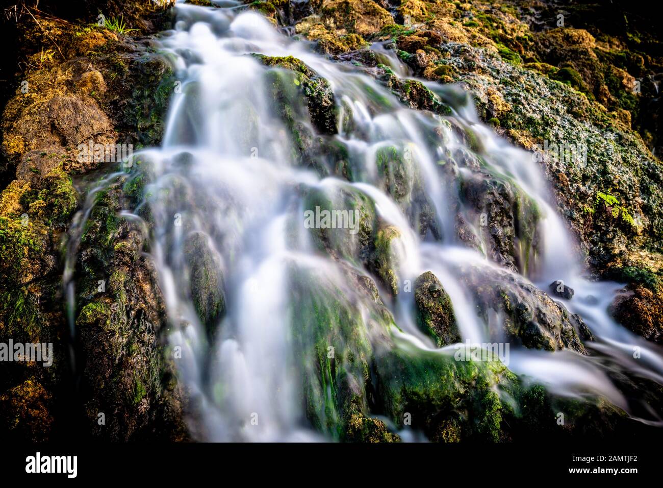 stone water channel full of running water in Tierra del Trigo village ...